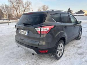 Grey Ford Kuga 2017 in Taurage, with an engine capacity of 2.00 L and mileage of 210 thousand km for 9700 €, photo 7 on AUTOMOTO.COM.LV