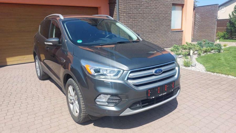 Grey Ford Kuga 2017 in Kaunas, with an engine capacity of 1.50 L and mileage of 210 thousand km for 7490 €, photo 1 on AUTOMOTO.COM.LV