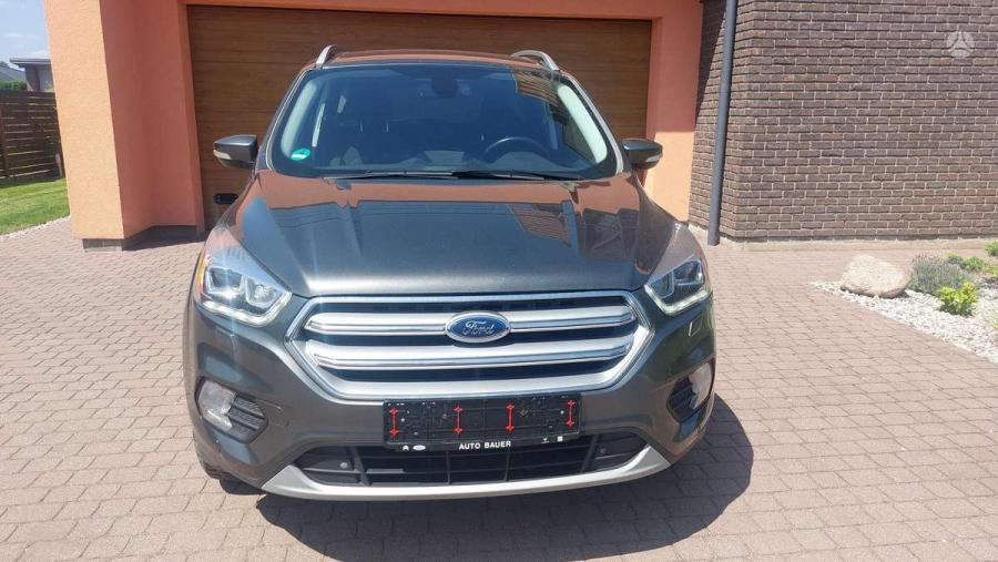 Grey Ford Kuga 2017 in Kaunas, with an engine capacity of 1.50 L and mileage of 210 thousand km for 7490 €, photo 5 on AUTOMOTO.COM.LV
