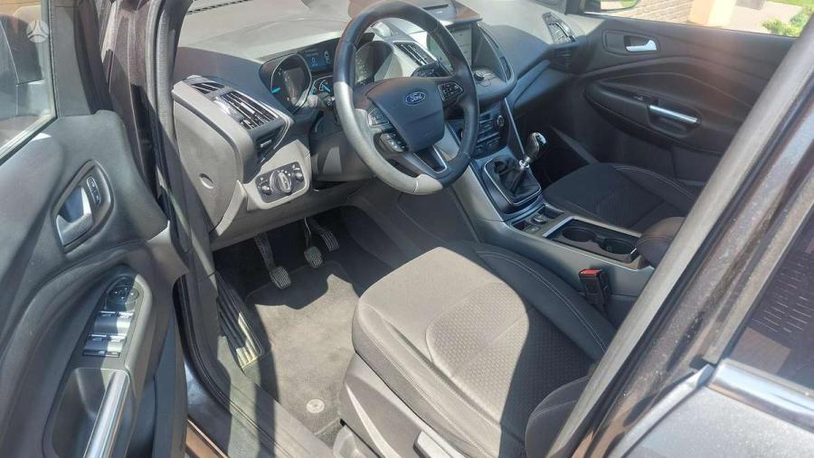 Grey Ford Kuga 2017 in Kaunas, with an engine capacity of 1.50 L and mileage of 210 thousand km for 7490 €, photo 12 on AUTOMOTO.COM.LV
