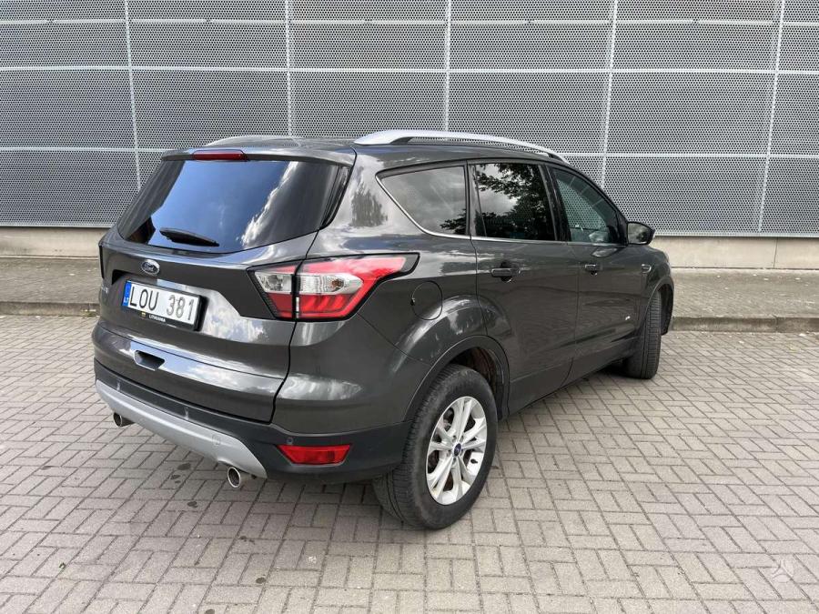 Grey Ford Kuga 2017 in Marijampole, with an engine capacity of 2.00 L and mileage of 231 thousand km for 8450 €, photo 1 on AUTOMOTO.COM.LV