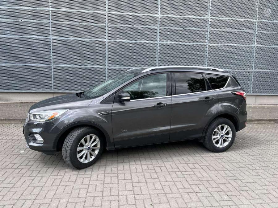 Grey Ford Kuga 2017 in Marijampole, with an engine capacity of 2.00 L and mileage of 231 thousand km for 8450 €, photo 6 on AUTOMOTO.COM.LV