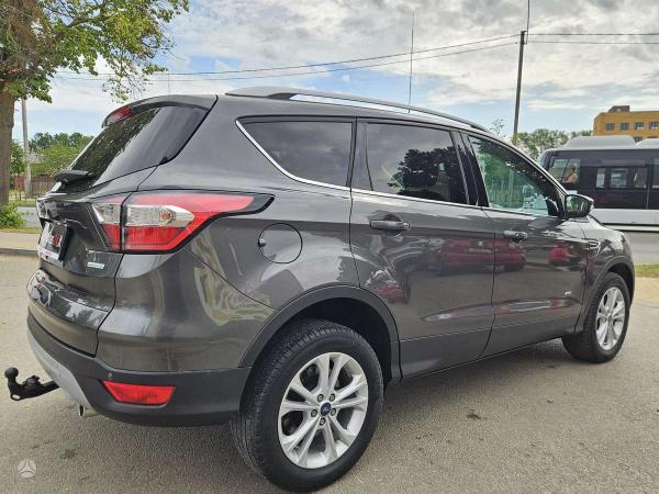 Grey Ford Kuga 2017 in Siauliai, with an engine capacity of 1.50 L and mileage of 137 thousand km for 10950 €, photo 6 on AUTOMOTO.COM.LV