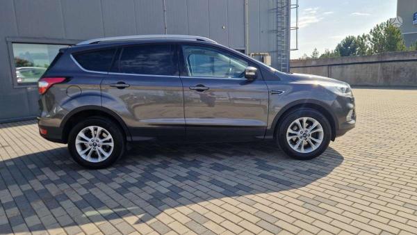 Ford Kuga 2017 Šauļi vietnē Pelēks Ford Kuga 2017 Šauļi, ar dzinēja tilpumu 1.50 L un nobraukumu 180 tūkst. km par 10800 €, foto 8 vietnē AUTOMOTO.COM.LV