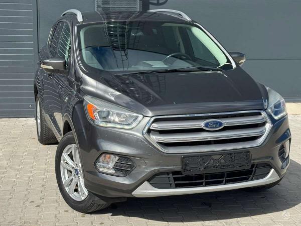 Ford Kuga 2017 Utena vietnē Pelēks Ford Kuga 2017 Utena, ar dzinēja tilpumu 1.50 L un nobraukumu 218 tūkst. km par 9200 €, foto 5 vietnē AUTOMOTO.COM.LV