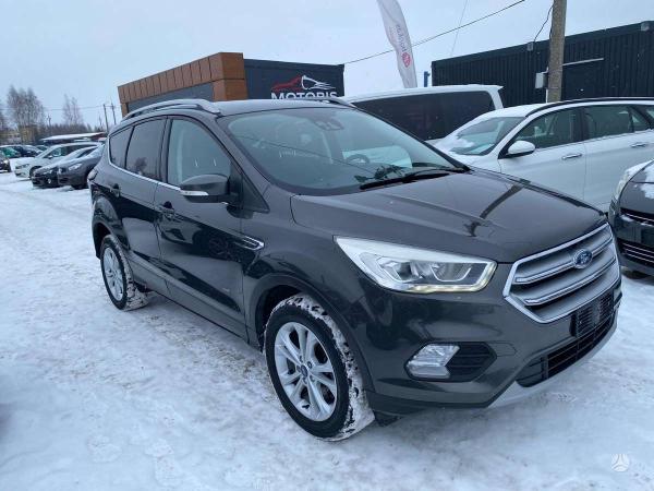 Grey Ford Kuga 2018 in Panevezys, with an engine capacity of 2.00 L and mileage of 164 thousand km for 10400 €, photo 1 on AUTOMOTO.COM.LV