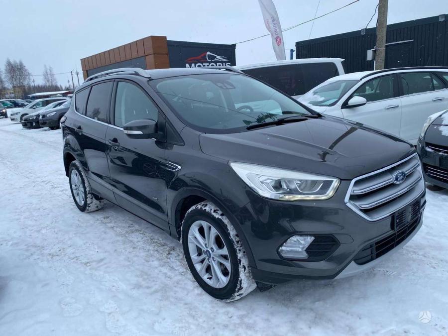 Grey Ford Kuga 2018 in Panevezys, with an engine capacity of 2.00 L and mileage of 164 thousand km for 10400 €, photo 1 on AUTOMOTO.COM.LV