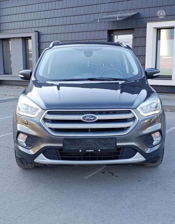 Grey Ford Kuga 2018 in Kaunas, with an engine capacity of 2.00 L and mileage of 231 thousand km for 7990 €, photo 2 on AUTOMOTO.COM.LV