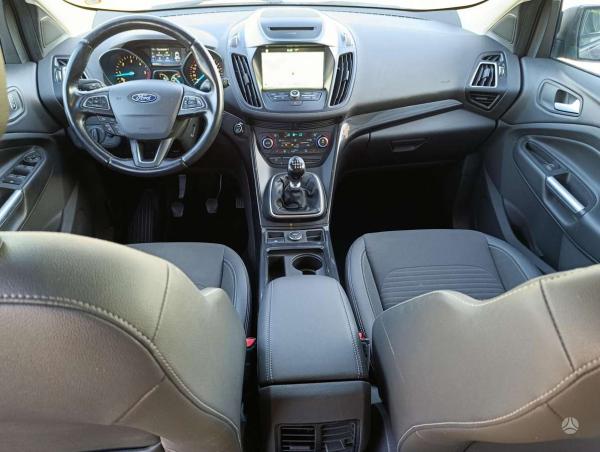 Grey Ford Kuga 2018 in Kaunas, with an engine capacity of 2.00 L and mileage of 231 thousand km for 7990 €, photo 8 on AUTOMOTO.COM.LV