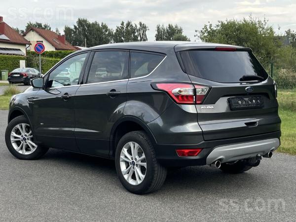 Grey Ford Kuga 2018 in Riga, with an engine capacity of 2.00 L and mileage of 200 thousand km for 9950 €, photo 2 on AUTOMOTO.COM.LV