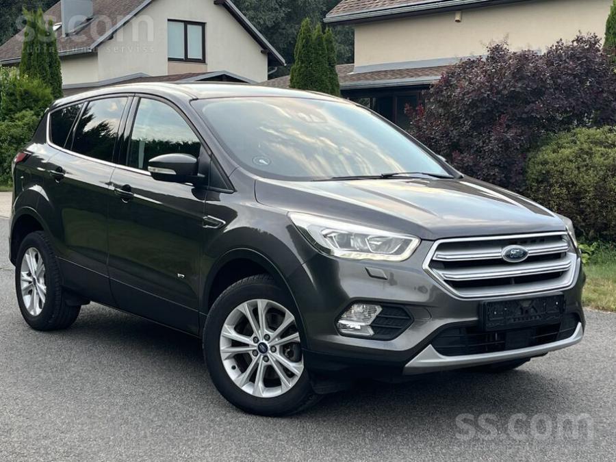 Grey Ford Kuga 2018 in Riga, with an engine capacity of 2.00 L and mileage of 200 thousand km for 9950 €, photo 4 on AUTOMOTO.COM.LV