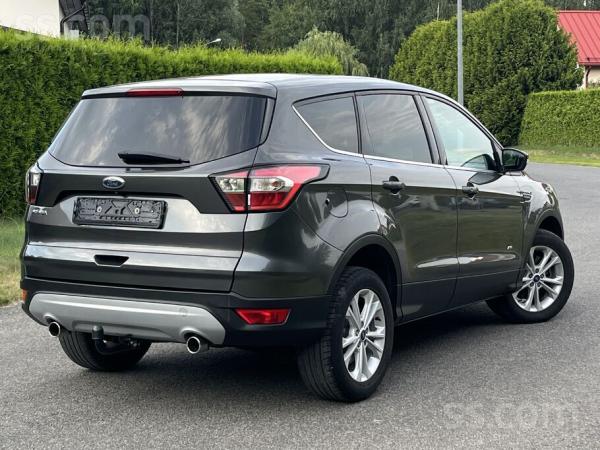 Grey Ford Kuga 2018 in Riga, with an engine capacity of 2.00 L and mileage of 200 thousand km for 9950 €, photo 4 on AUTOMOTO.COM.LV