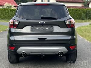 Grey Ford Kuga 2018 in Riga, with an engine capacity of 2.00 L and mileage of 200 thousand km for 9950 €, photo 7 on AUTOMOTO.COM.LV