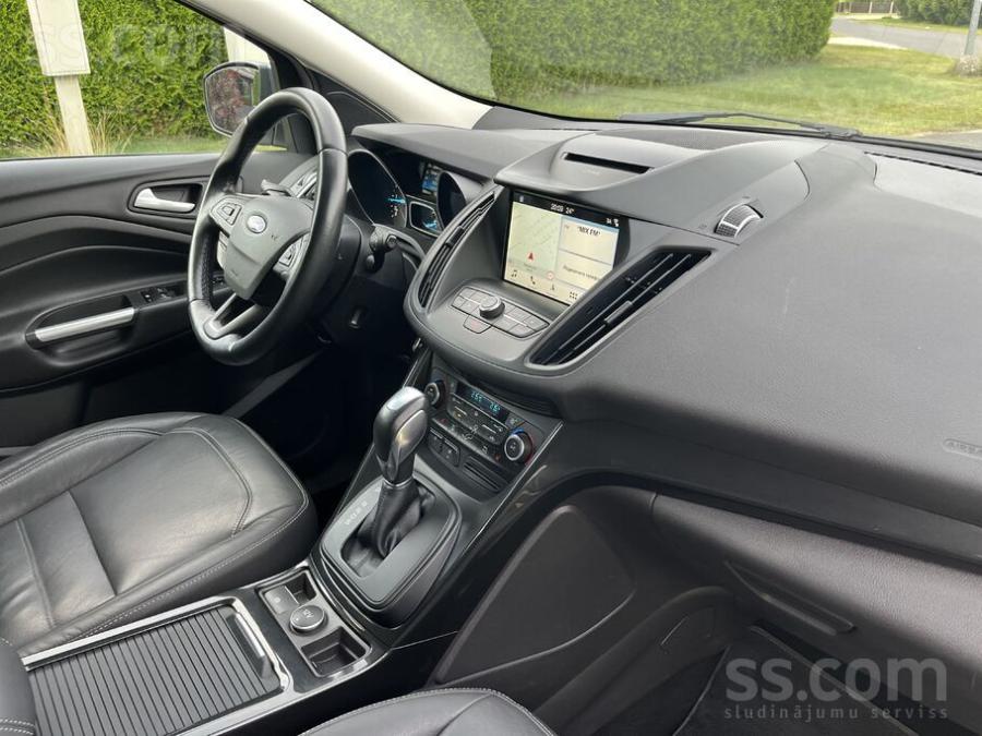 Grey Ford Kuga 2018 in Riga, with an engine capacity of 2.00 L and mileage of 200 thousand km for 9950 €, photo 9 on AUTOMOTO.COM.LV