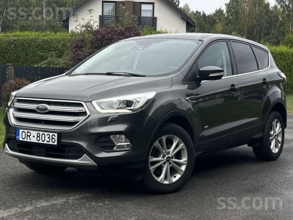 Grey Ford Kuga 2018 in Riga, with an engine capacity of 2.00 L and mileage of 200 thousand km for 9950 €, photo 1 on AUTOMOTO.COM.LV