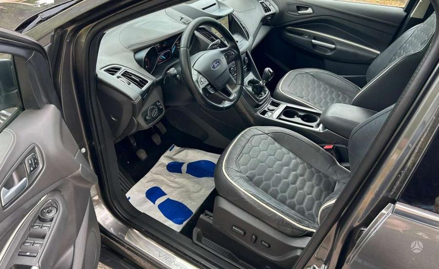 Grey Ford Kuga 2018 in Taurage, with an engine capacity of 2.00 L and mileage of 270 thousand km for 7900 €, photo 7 on AUTOMOTO.COM.LV