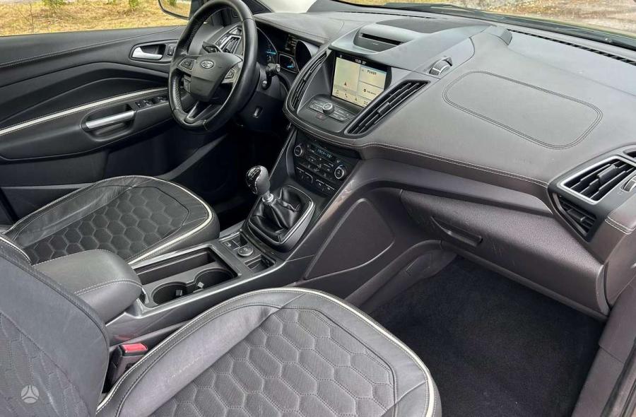 Grey Ford Kuga 2018 in Taurage, with an engine capacity of 2.00 L and mileage of 270 thousand km for 7900 €, photo 9 on AUTOMOTO.COM.LV