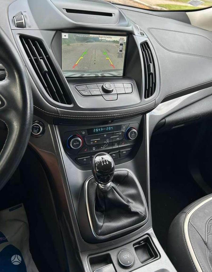 Grey Ford Kuga 2018 in Taurage, with an engine capacity of 2.00 L and mileage of 270 thousand km for 7900 €, photo 12 on AUTOMOTO.COM.LV