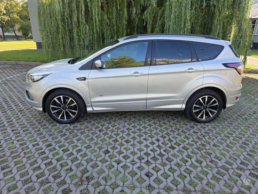 Grey Ford Kuga 2018 in Jonava, with an engine capacity of 2.00 L and mileage of 273 thousand km for 11600 €, photo 7 on AUTOMOTO.COM.LV