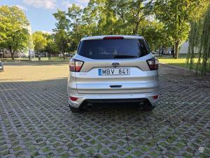 Grey Ford Kuga 2018 in Jonava, with an engine capacity of 2.00 L and mileage of 273 thousand km for 11600 €, photo 11 on AUTOMOTO.COM.LV