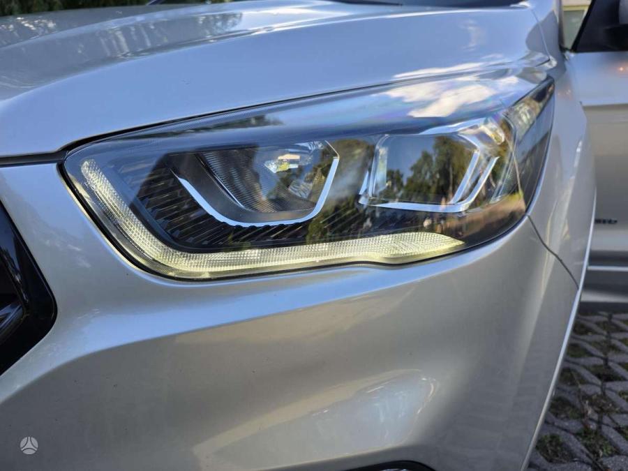Grey Ford Kuga 2018 in Jonava, with an engine capacity of 2.00 L and mileage of 273 thousand km for 11600 €, photo 21 on AUTOMOTO.COM.LV