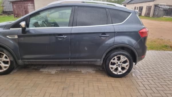 Grey Ford Kuga 2019 in Moletai, with an engine capacity of 2.00 L and mileage of 303 thousand km for 4500 €, photo 5 on AUTOMOTO.COM.LV