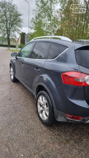 Grey Ford Kuga 2019 in Moletai, with an engine capacity of 2.00 L and mileage of 303 thousand km for 4500 €, photo 7 on AUTOMOTO.COM.LV