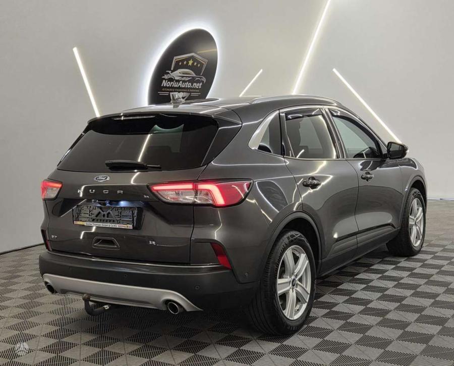 Grey Ford Kuga 2021 in Marijampole, with an engine capacity of 2.00 L and mileage of 82 thousand km for 17999 €, photo 37 on AUTOMOTO.COM.LV