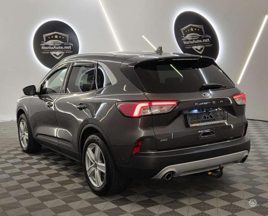 Grey Ford Kuga 2021 in Marijampole, with an engine capacity of 2.00 L and mileage of 82 thousand km for 17999 €, photo 38 on AUTOMOTO.COM.LV