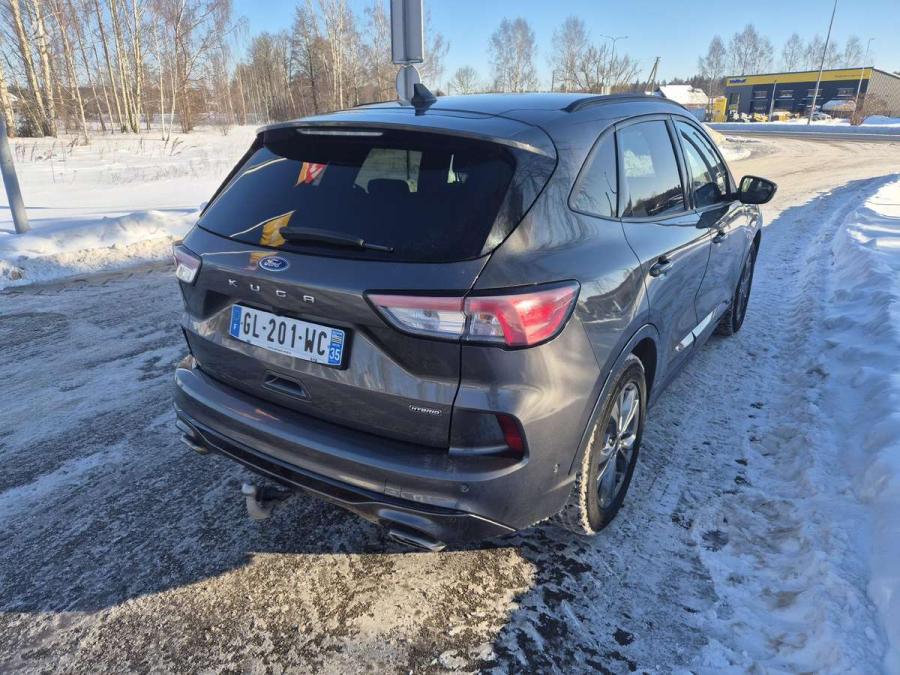 Grey Ford Kuga 2023 in Taurage, with an engine capacity of 2.49 L and mileage of 293 thousand km for 13552 €, photo 4 on AUTOMOTO.COM.LV