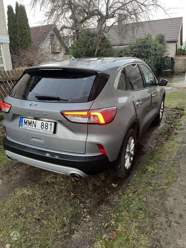 Grey Ford Kuga 2023 in Klaipeda, with an engine capacity of 1.50 L and mileage of 77 thousand km for 20500 €, photo 1 on AUTOMOTO.COM.LV
