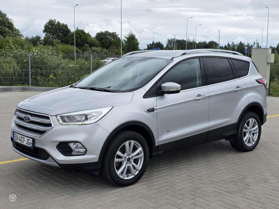 Grey Ford Kuga 2017 in Taurage, with an engine capacity of 2.00 L and mileage of 212 thousand km for 8900 €, photo 1 on AUTOMOTO.COM.LV