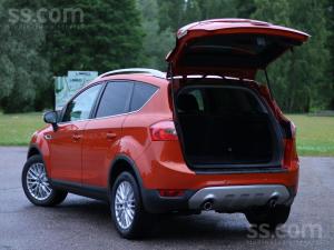 Orange Ford Kuga 2011 in Limbazi, with an engine capacity of 2.00 L and mileage of 221 thousand km for 6500 €, photo 10 on AUTOMOTO.COM.LV