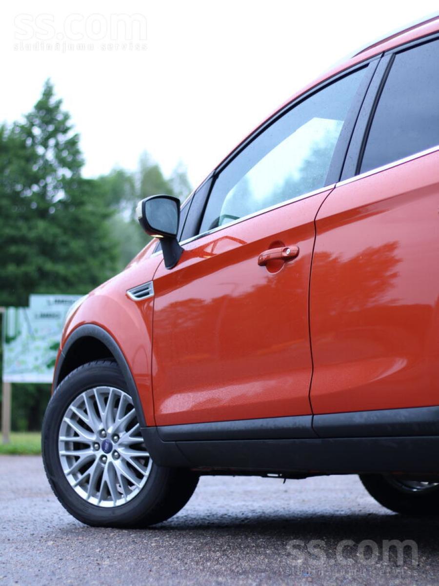 Orange Ford Kuga 2011 in Limbazi, with an engine capacity of 2.00 L and mileage of 221 thousand km for 6500 €, photo 14 on AUTOMOTO.COM.LV
