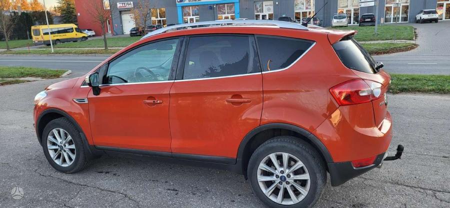 Orange Ford Kuga 2012 in Panevezys, with an engine capacity of 2.00 L and mileage of 254 thousand km for 4300 €, photo 1 on AUTOMOTO.COM.LV