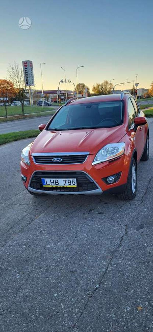 Orange Ford Kuga 2012 in Panevezys, with an engine capacity of 2.00 L and mileage of 254 thousand km for 4300 €, photo 2 on AUTOMOTO.COM.LV