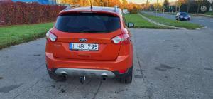 Orange Ford Kuga 2012 in Panevezys, with an engine capacity of 2.00 L and mileage of 254 thousand km for 4300 €, photo 5 on AUTOMOTO.COM.LV