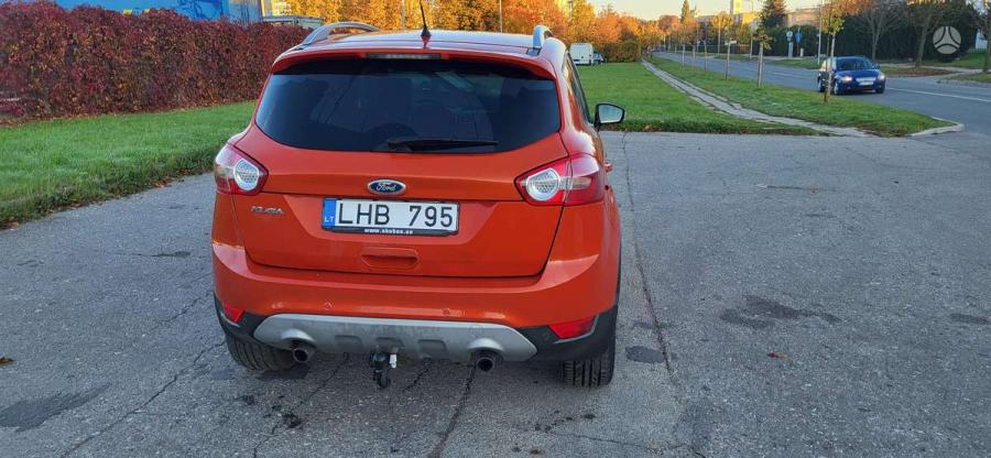 Orange Ford Kuga 2012 in Panevezys, with an engine capacity of 2.00 L and mileage of 254 thousand km for 4300 €, photo 5 on AUTOMOTO.COM.LV
