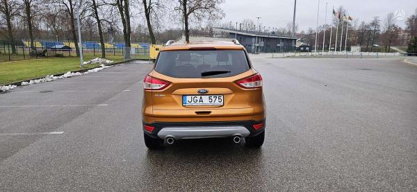Orange Ford Kuga 2016 in Kedainiai, with an engine capacity of 2.00 L and mileage of 116 thousand km for 9900 €, photo 7 on AUTOMOTO.COM.LV