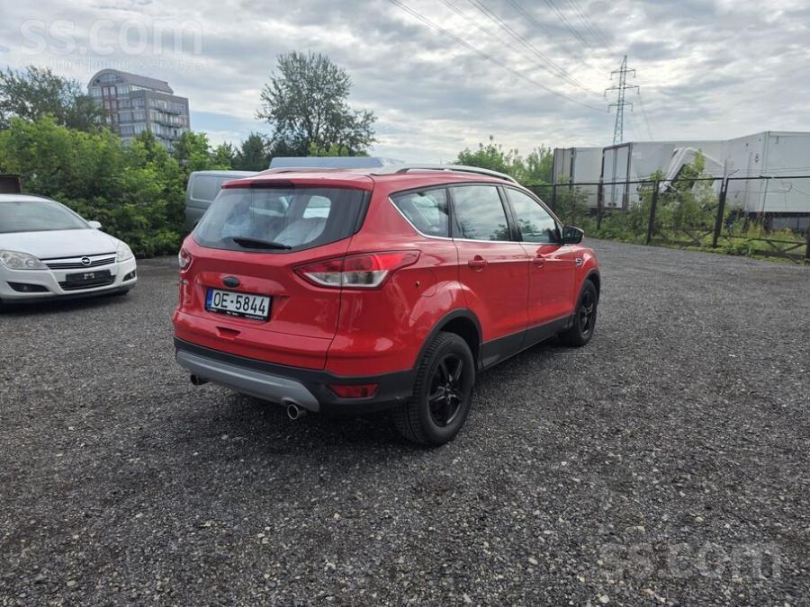 Red Ford Kuga 2014 in Riga, with an engine capacity of 2.00 L and mileage of 217 thousand km for 9990 €, photo 6 on AUTOMOTO.COM.LV