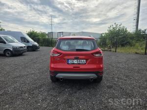 Red Ford Kuga 2014 in Riga, with an engine capacity of 2.00 L and mileage of 217 thousand km for 9990 €, photo 7 on AUTOMOTO.COM.LV