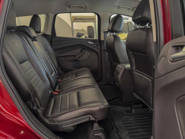 Red Ford Kuga 2014 in Riga, with an engine capacity of 1.60 L and mileage of 90 thousand km for 11900 €, photo 8 on AUTOMOTO.COM.LV