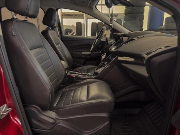Red Ford Kuga 2014 in Riga, with an engine capacity of 1.60 L and mileage of 90 thousand km for 11900 €, photo 9 on AUTOMOTO.COM.LV