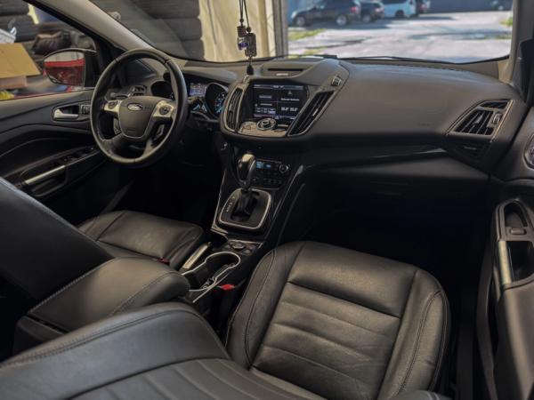 Red Ford Kuga 2014 in Riga, with an engine capacity of 1.60 L and mileage of 90 thousand km for 11900 €, photo 10 on AUTOMOTO.COM.LV
