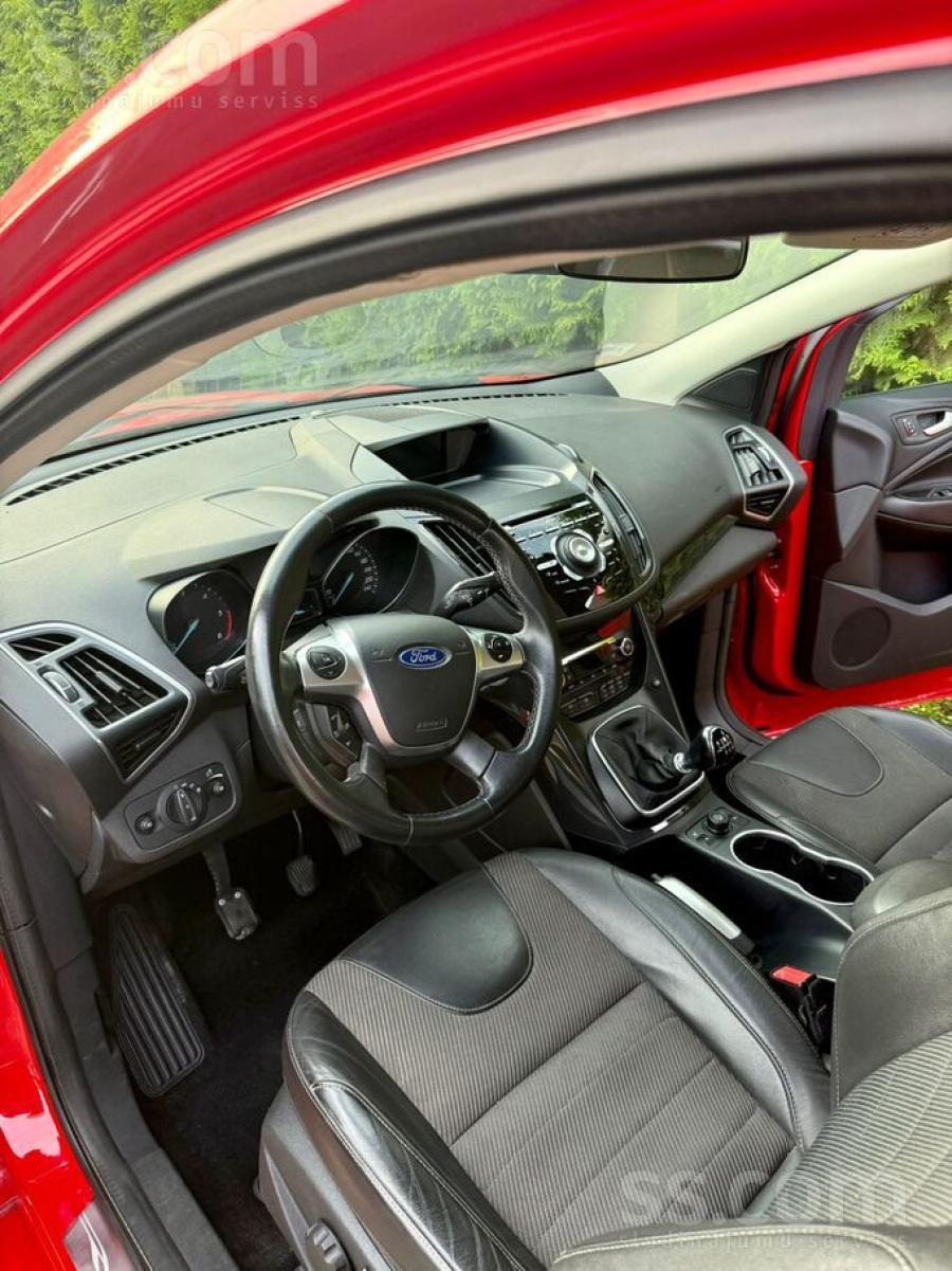 Red Ford Kuga 2015 in Jelgava, with an engine capacity of 2.00 L and mileage of 253 thousand km for 8400 €, photo 11 on AUTOMOTO.COM.LV