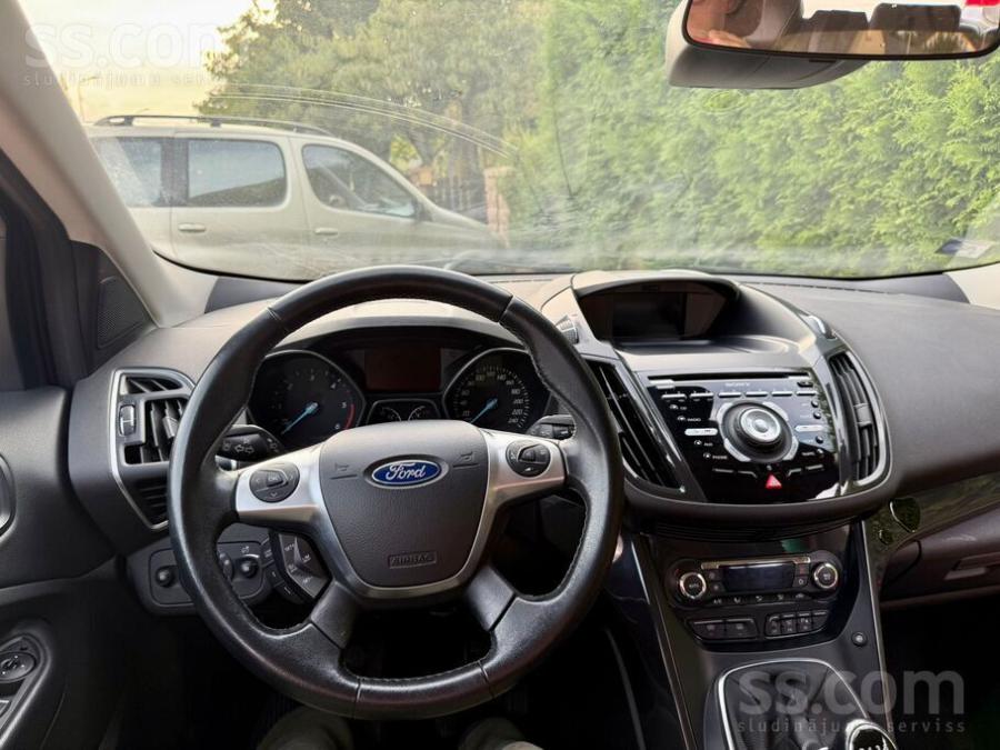 Red Ford Kuga 2015 in Jelgava, with an engine capacity of 2.00 L and mileage of 253 thousand km for 8400 €, photo 13 on AUTOMOTO.COM.LV