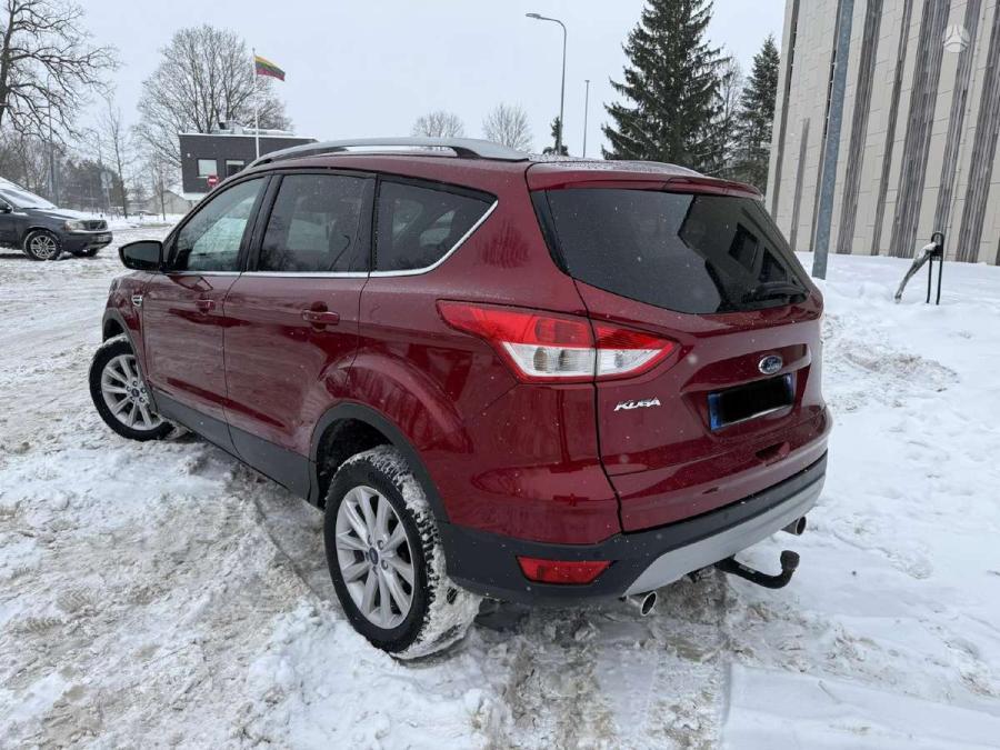 Red Ford Kuga 2016 in Taurage, with an engine capacity of 2.00 L and mileage of 258 thousand km for 7800 €, photo 6 on AUTOMOTO.COM.LV