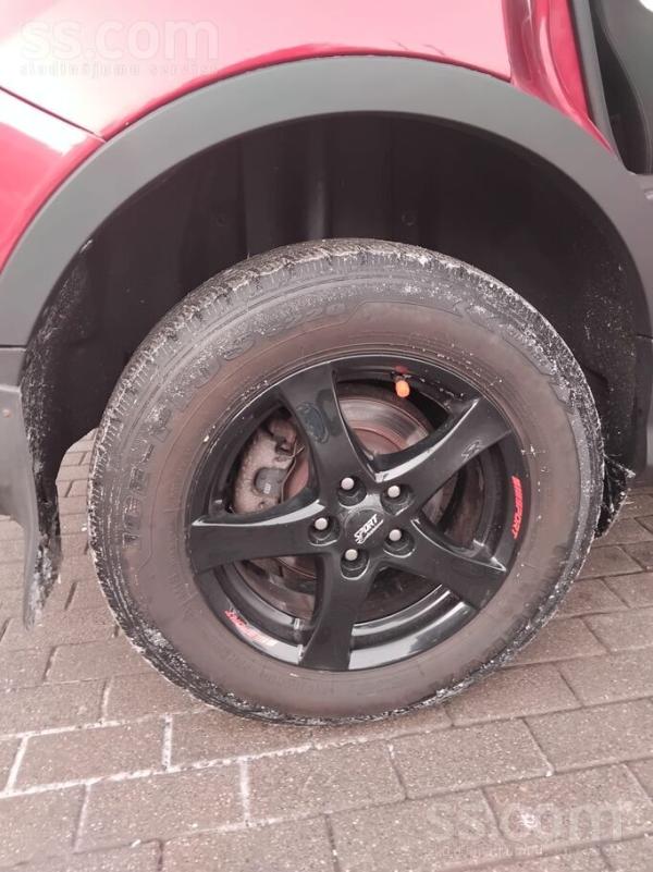 Red Ford Kuga 2016 in Kraslava, with an engine capacity of 2.00 L and mileage of 187 thousand km for 10000 €, photo 9 on AUTOMOTO.COM.LV
