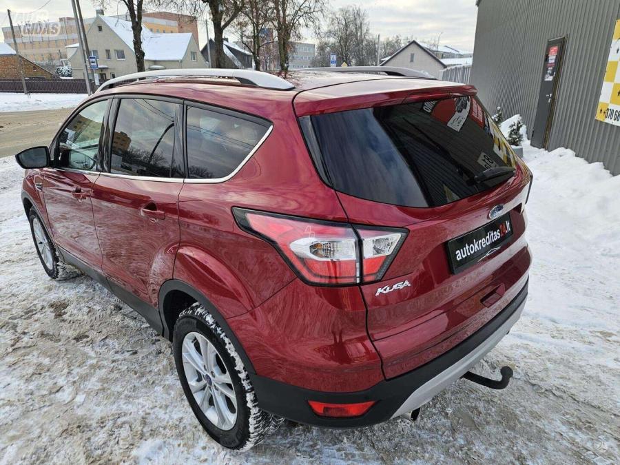 Red Ford Kuga 2017 in Siauliai, with an engine capacity of 1.50 L and mileage of 120 thousand km for 11950 €, photo 5 on AUTOMOTO.COM.LV