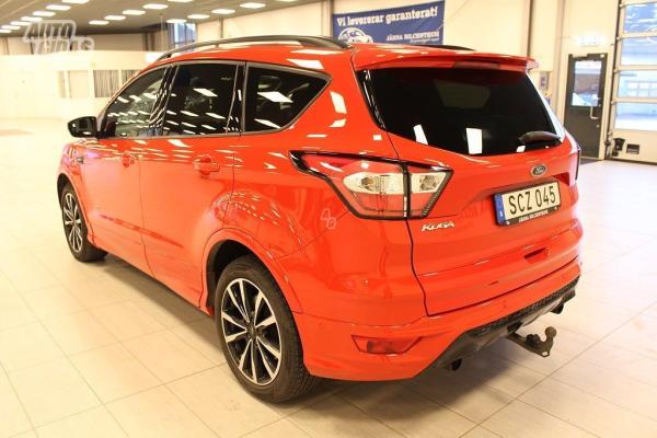 Red Ford Kuga 2018 in Kaunas, with an engine capacity of 0.00 L and mileage of 63 thousand km for 24364 €, photo 6 on AUTOMOTO.COM.LV